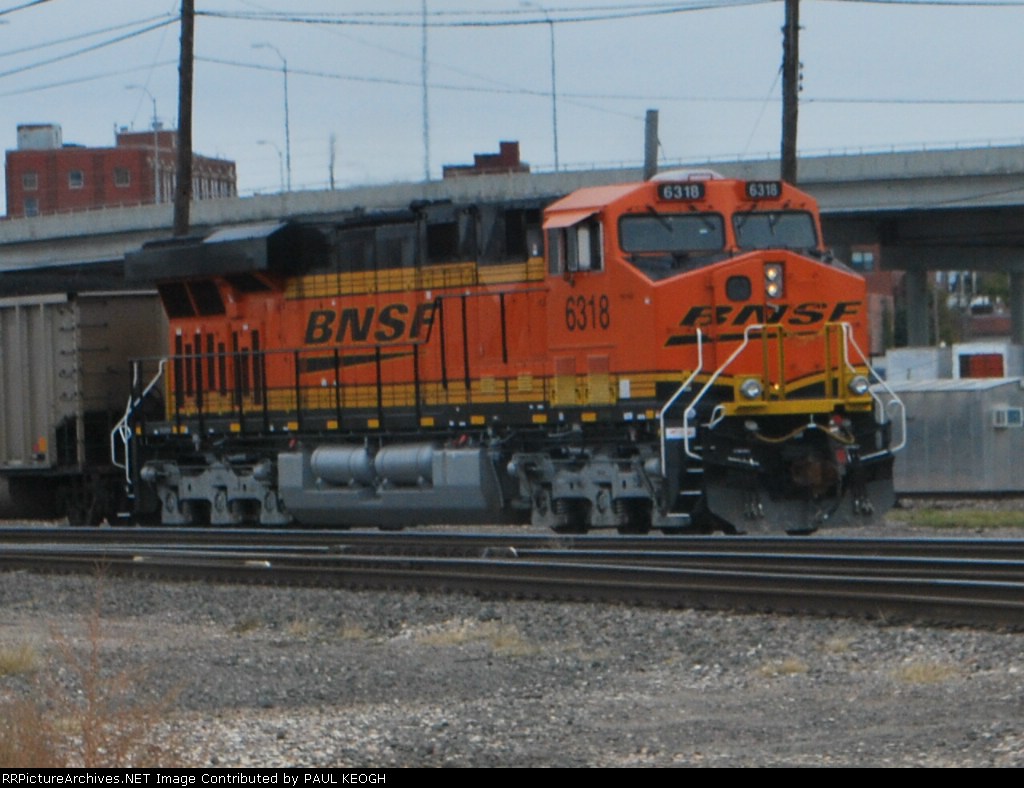 BNSF 6318 rolls east as a rear DPU unit on a loaded coal train going to Creston, IA.
